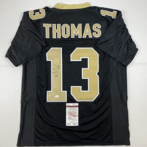 autographed/signed michael thomas new orleans black football jersey jsa coa