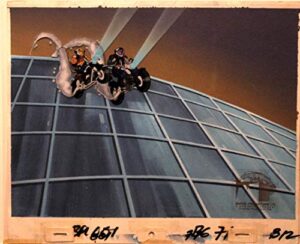 marvel’s biker mice from mars production cel of throttle & modo jumping their motorcycles off of the building. on its matching production background 1993