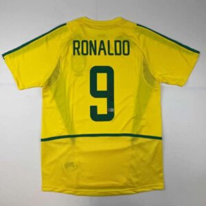 autographed/signed ronaldo nazario brazil yellow soccer jersey beckett bas coa