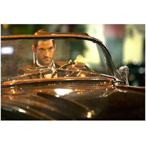 lucifer (tv series 2015 – ) 8 inch by 10 inch photograph tom ellis at wheel of black convertible kn