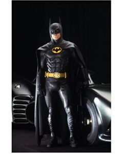 michael keaton as bruce wayne aka batman standing nex to the batmobile 8 x 10 inch photo