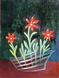 red lilies and vase shaped as a ship