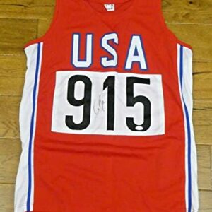 Carl Lewis Signed USA Olympic Jersey with JSA Sticker No Card