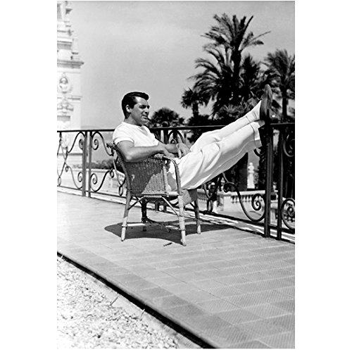 Cary Grant 8x10 Photo North by Northwest Bringing Up Baby Notorious His Girl Friday B&W Relaxing w/Feet Up on Railing kn