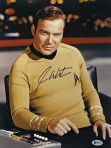 william shatner autographed 11×14 star trek sitting photo – beckett auth black