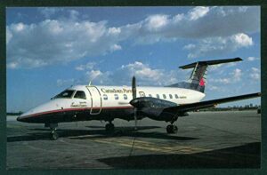 ontario express canada airlines toronto lester b. pearson international airport airplane postcard