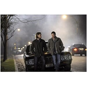 supernatural jared padalecki as sam winchester and jensen ackles as dean winchester sitting together 8 x 10 inch photo