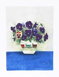 purple pansies in cup