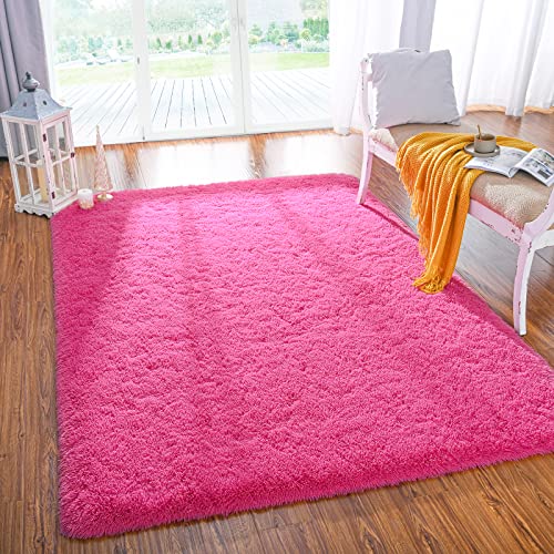 Rtizon Super Soft Fluffy Bedroom Rug, 5.3x7.6 Feet Shag Rug with Non-Slip Bottom for Bedside Living Room Dorm Nursery, Fuzzy Furry Shaggy Area Rug for Indoor Kids Baby Home Decor, Hot Pink