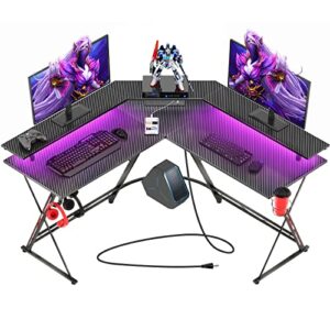 seven warrior l shaped gaming desk with led lights & power outlets, 50.4” computer desk with monitor stand & carbon fiber surface, corner desk with cup holder, gaming table with hooks, black