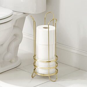 mDesign Decorative Free Standing Toilet Paper Holder Stand with Storage for 3 Rolls of Toilet Tissue - for Bathroom/Powder Room - Holds Mega Rolls - Durable Metal Wire - Soft Brass