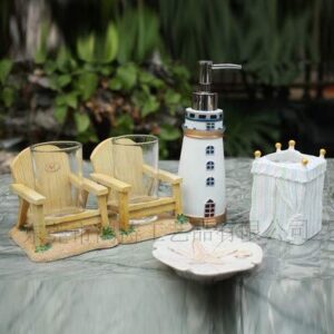 rushi nautical bathroom accessory set, 5 pcs; 1 lighthouse hand soap holder; 1 beach tent toothbrush container; 2 beach chairs glass holders and 1 starfish themed soap dish