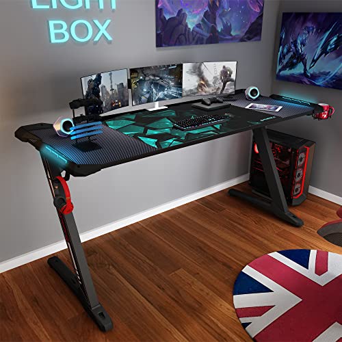 DESIGNA 60" Gaming Desk with RGB LED Lights, Large Z-Shaped Gaming PC Desk with Carbon Fiber Desktop Home Office Computer Game Desk Table for Gamer W Mouse Pad, Cup Holder, Headphone Hook, Black