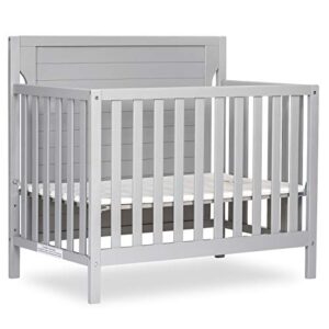 dream on me bellport 4 in 1 convertible mini/portable crib in pebble grey, non-toxic finish, made of sustainable new zealand pinewood, with 3 mattress height settings