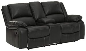 signature design by ashley calderwell faux leather manual double reclining loveseat with storage console, black