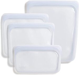 stasher silicone reusable storage bag, bundle 4-pack small (clear) | food meal prep storage container | lunch, travel, makeup, gym bag | freezer, oven, microwave, dishwasher safe, leakproof