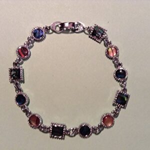 Shell of the Sea This circle & square Paua shell link bracelet is so cute & 7"