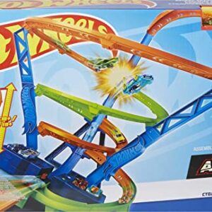 Hot Wheels Toy Car Track Set Spiral Speed Crash, Powered by Motorized Booster, 29-in Tall Track with 1:64 Scale Car