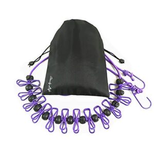 adjustable elastic clothesline with clips and positioning balls portable retractable windproof laundry hanging rope for travel camping indoor use anti-skid washing line with drawstring bag purple