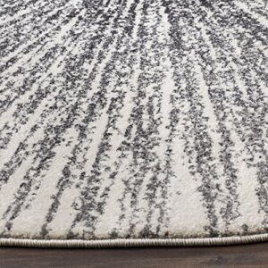 SAFAVIEH Evoke Collection Area Rug - 3' Round, Black & Ivory, Abstract Burst Design, Non-Shedding & Easy Care, Ideal for High Traffic Areas in Living Room, Bedroom (EVK228K)