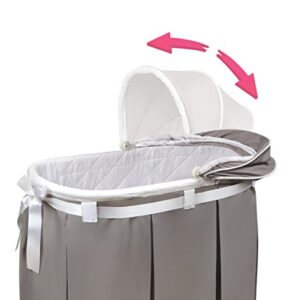 Wishes Oval Rocking Baby Bassinet with Bedding, Storage, and Pad