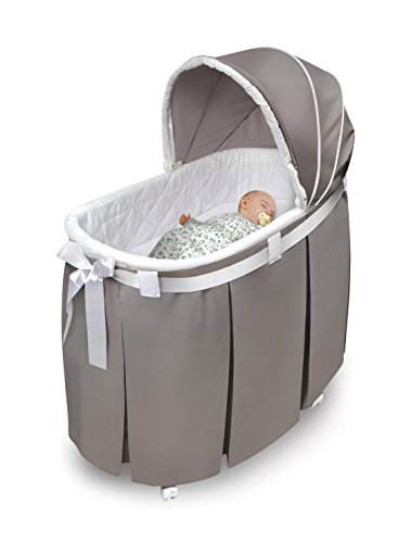 Wishes Oval Rocking Baby Bassinet with Bedding, Storage, and Pad