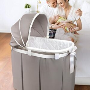 Wishes Oval Rocking Baby Bassinet with Bedding, Storage, and Pad