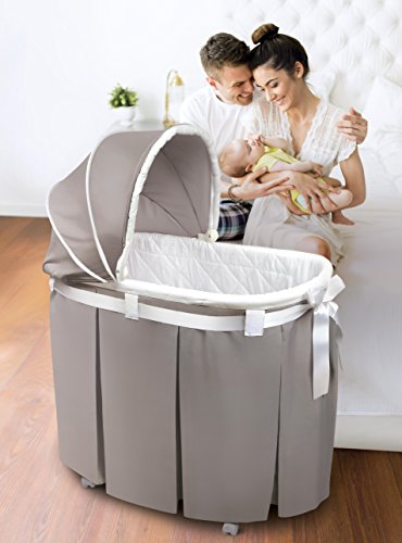 Wishes Oval Rocking Baby Bassinet with Bedding, Storage, and Pad