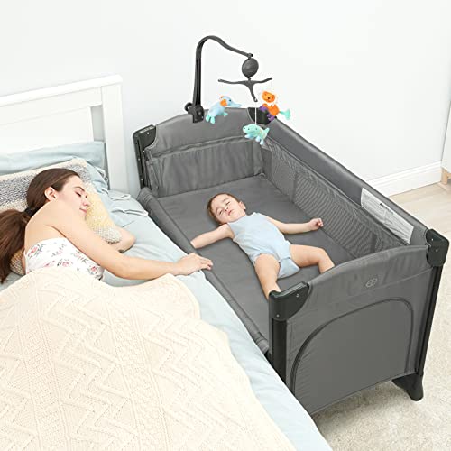 JOYMOR Baby Bedside Sleeper, Extra Large Bed Side Bassinet, Pack n Play Convert Playpen, Quick Foldable Travel Bassinet Bed, with Toy, Wheels & Brake, Carry Bag for Boys Girls