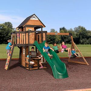 backyard discovery canyon creek all cedar wood swing set, playhouse with grill, plastic food, picnic area, steering wheel, two belt swings, rock climbing wall, balcony, deck, slide, web swing,brown