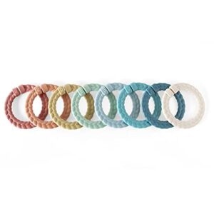 itzy ritzy linking ring set; set of 8 braided, rainbow-colored versatile linking rings; attach to car seats, strollers & activity gyms; rainbow