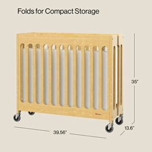 Foundations Boutique Compact Folding Crib, Modern, Contemporary, Mini Crib for Guest Rooms, Vacation Homes, and Small Nurseries, Available in 5 Finishes, Mattress Included (Natural)