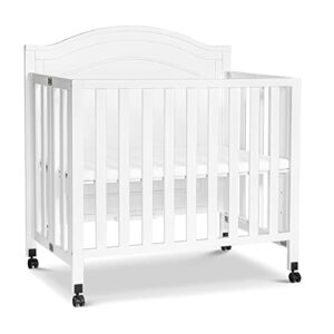 davinci charlie folding portable 3-in-1 convertible mini crib and twin bed in white, removable wheels, greenguard gold certified