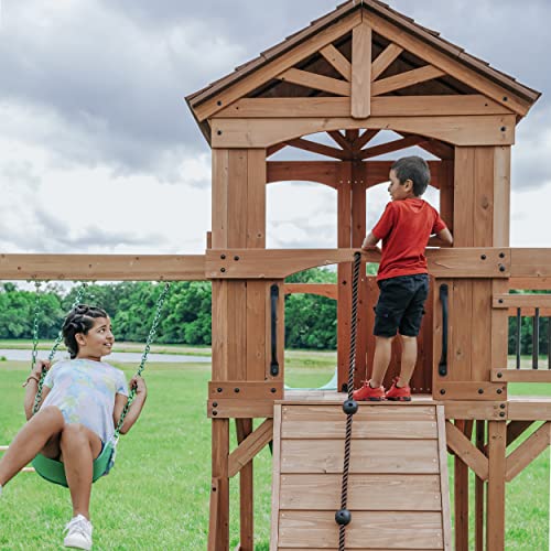 Backyard Discovery Sterling Point All Cedar Wooden Swing Set, Raised Clubhouse,Web Swing, Climbing Wall, 10ft Wave Slide, 2 Belt Swings, Front Porch, Bridge