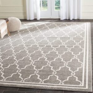 SAFAVIEH Amherst Collection Area Rug - 8' x 10', Navy & Beige, Trellis Design, Non-Shedding & Easy Care, Ideal for High Traffic Areas in Living Room, Bedroom (AMT414P)