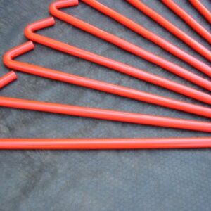 A 12 Pack of 18" long metal hook stakes.coated in Safety Orange Baked on Enamel