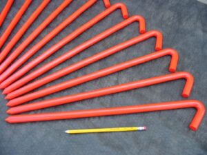 a 24 pack of steel hook stakes.18" long.coated with safety orange enamel