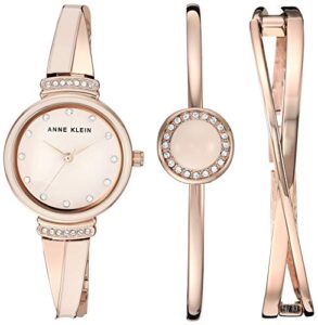 anne klein women's ak/3292lpst premium crystal accented rose gold-tone and blush pink watch and bangle set