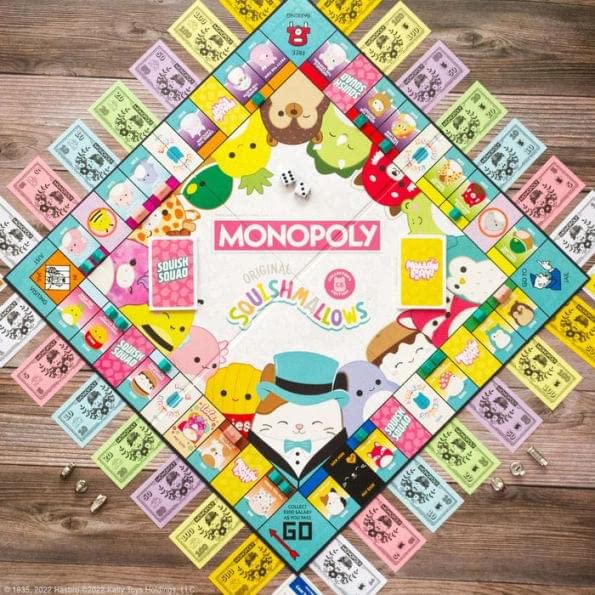 Monopoly: Squishmallows | Collector’s Edition Featuring Cam The Cat Plush | Buy, Sell, Trade Spaces Featuring Squshmallows | Collectible Classic Monopoly Game | Officially-Licensed Squishmallows Game