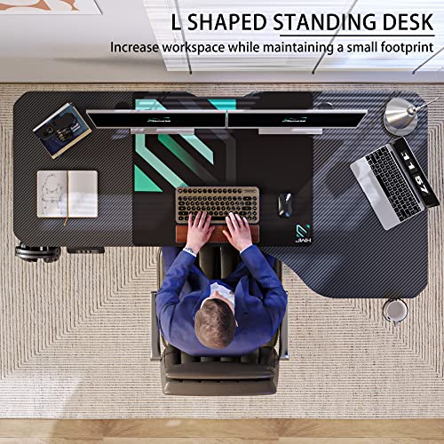 JWX Standing Adjustable Desk, 63 inches L Shaped Electric Standing Gaming Desk with Locking Wheels, Cup Holder, Headphone Hook, Cable Manager, Mouse pad, Carbon Fiber Textured Pane