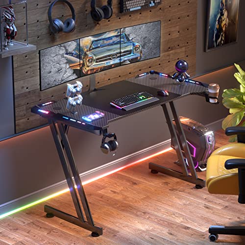 HLDIRECT 47 Inch Gaming Desk with LED Lights Carbon Fibre Surface Gaming Table Large Computer Desk Ergonomic Home Office Desks Z Shaped PC Gamer Workstations with Cup Holder & Headphone Hook Black