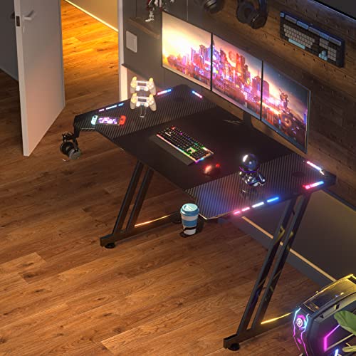 HLDIRECT 47 Inch Gaming Desk with LED Lights Carbon Fibre Surface Gaming Table Large Computer Desk Ergonomic Home Office Desks Z Shaped PC Gamer Workstations with Cup Holder & Headphone Hook Black