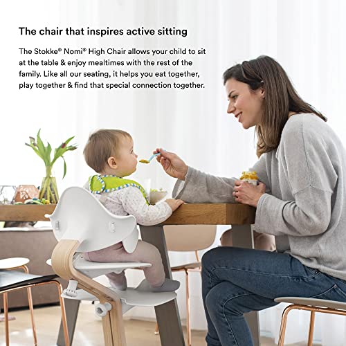 Stokke Nomi High Chair, Grey/Natural - Inspires Active Sitting - Tool-Free, Seamless Adjustability - Includes Baby Set with Removable Harness for Children 6-24 Months