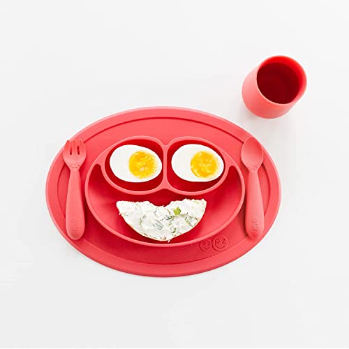 ezpz Mini Collection Set (Coral) - 100% Silicone Cup, Fork, Spoon & Mini Mat Suction Plate with Built-in Placemat for Infants + Toddlers - First Foods + Self-Feeding - 12 Months+