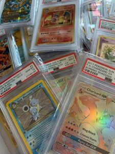 one random psa graded and authenticated encased pokemon card (perfect for display)