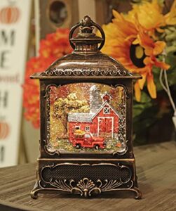 harvest lighted water lantern in swirling glitter - harvest scene with red truck, red barn