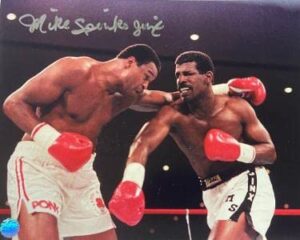 michael spinks signed boxing collage 8x10 photo jinx- awm hologram (vs larry holmes) - autographed boxing photos