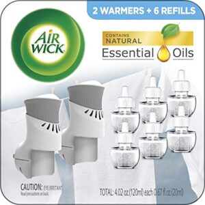 air wick plug in scented oil starter kit, 2 warmers + 6 refills, fresh linen, same familiar smell of fresh laundry, eco friendly, essential oils, air freshener