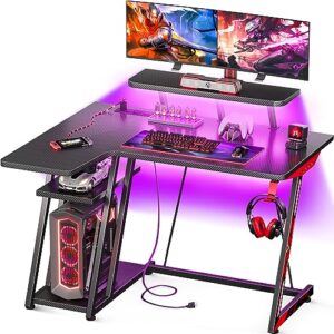 motpk l shaped gaming desk with led lights & power outlets, small gaming computer desk 39inch with storage shelf, corner desk with carbon fiber texture, gamer desk gaming table, black