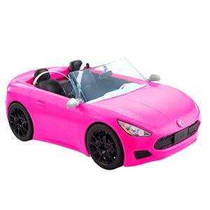 barbie toy car, bright pink 2-seater convertible with seatbelts and rolling wheels, realistic details